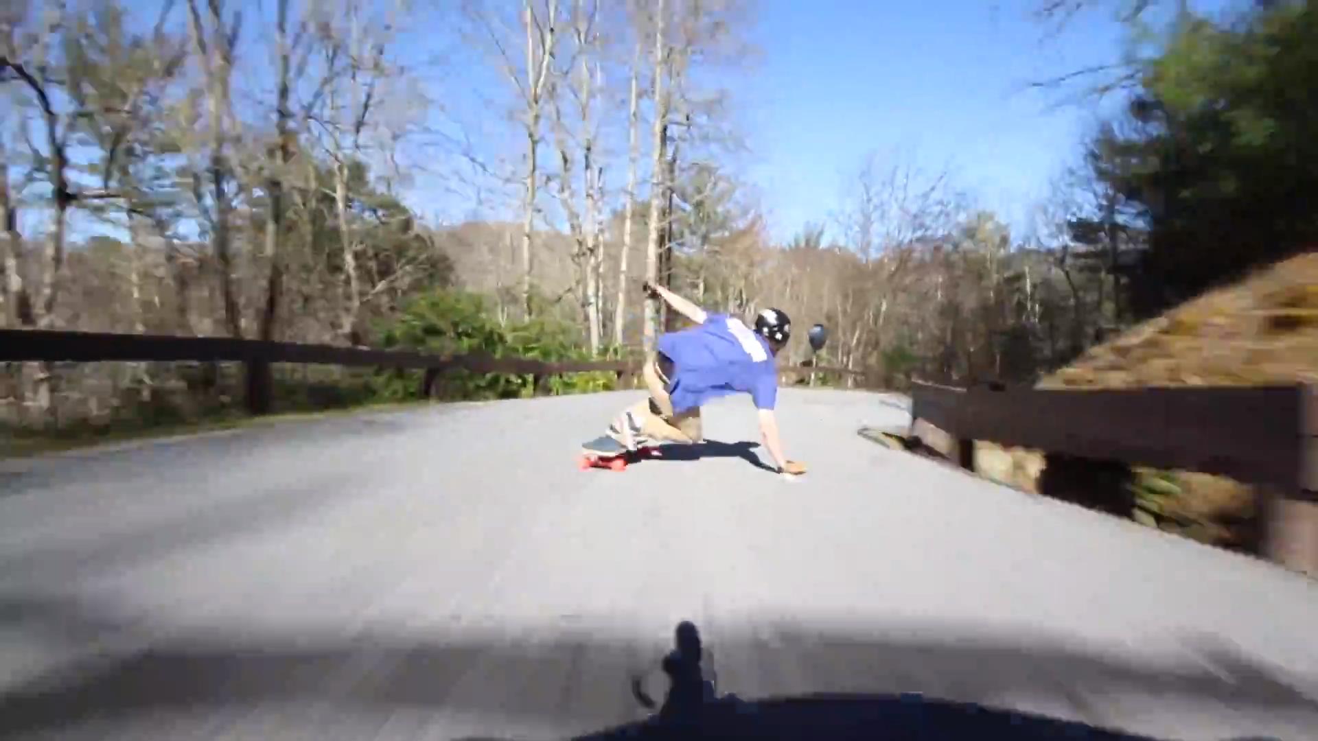 Guy Skateboarding Downhill Fails to Make a Turn and Falls | Jukin Media Inc