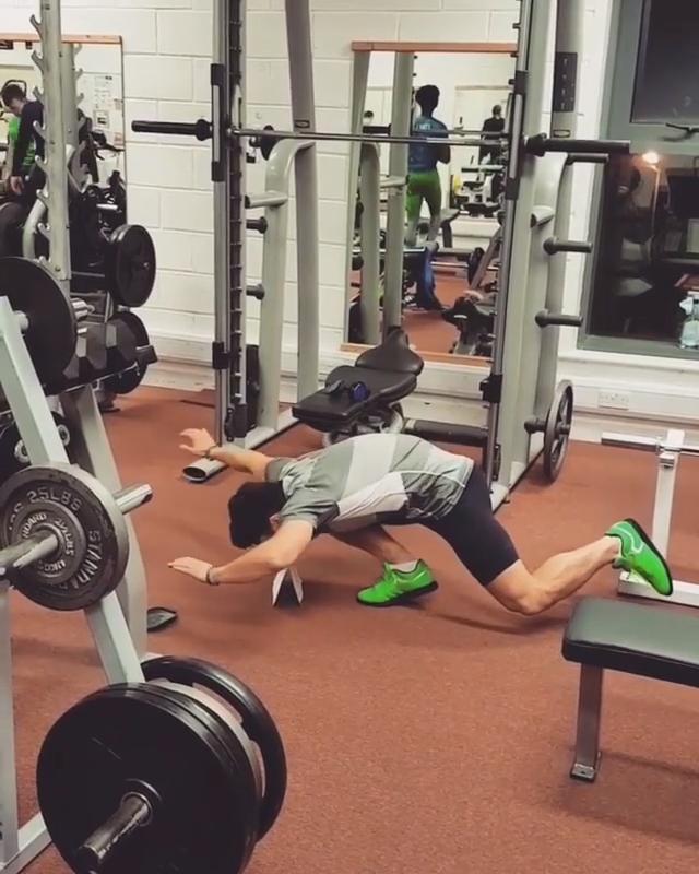 Guy Balancing on One Leg Picks up Paper With Mouth | Jukin Licensing