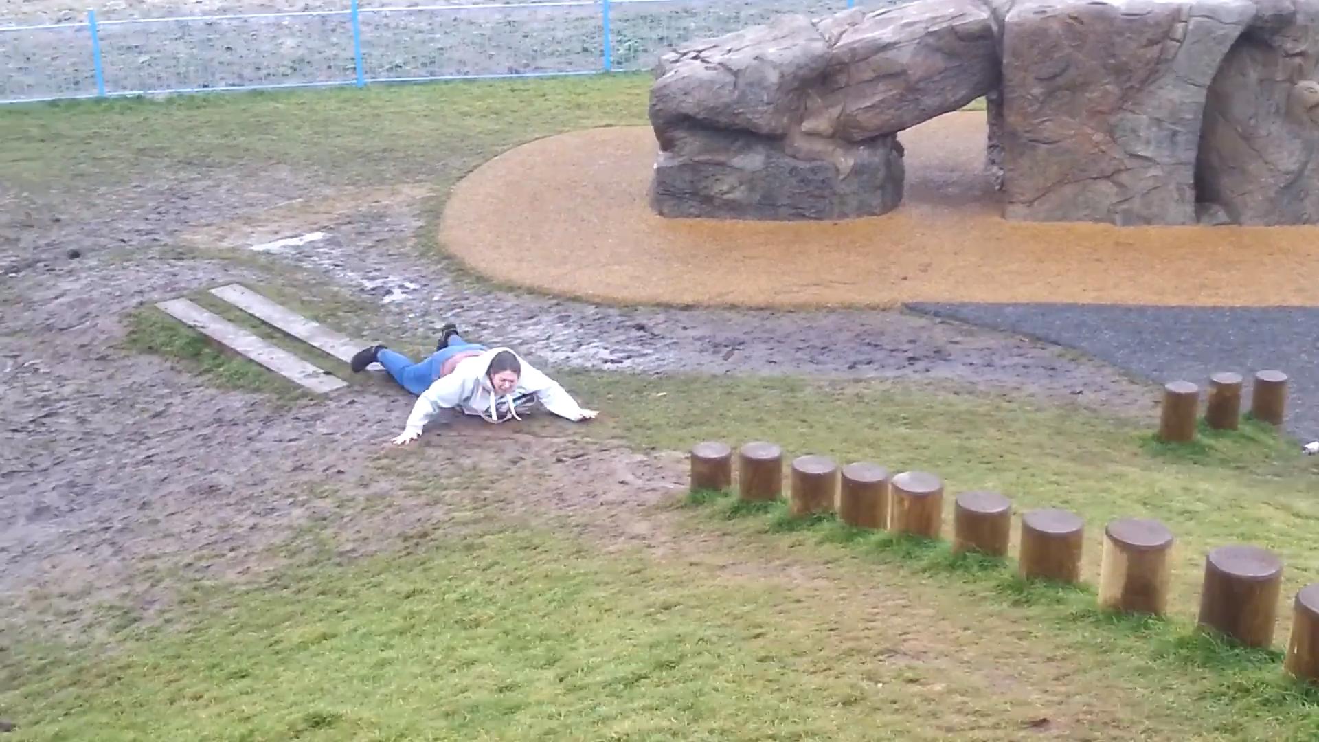 Woman Slips and Falls in Mud at Playground | Jukin Licensing