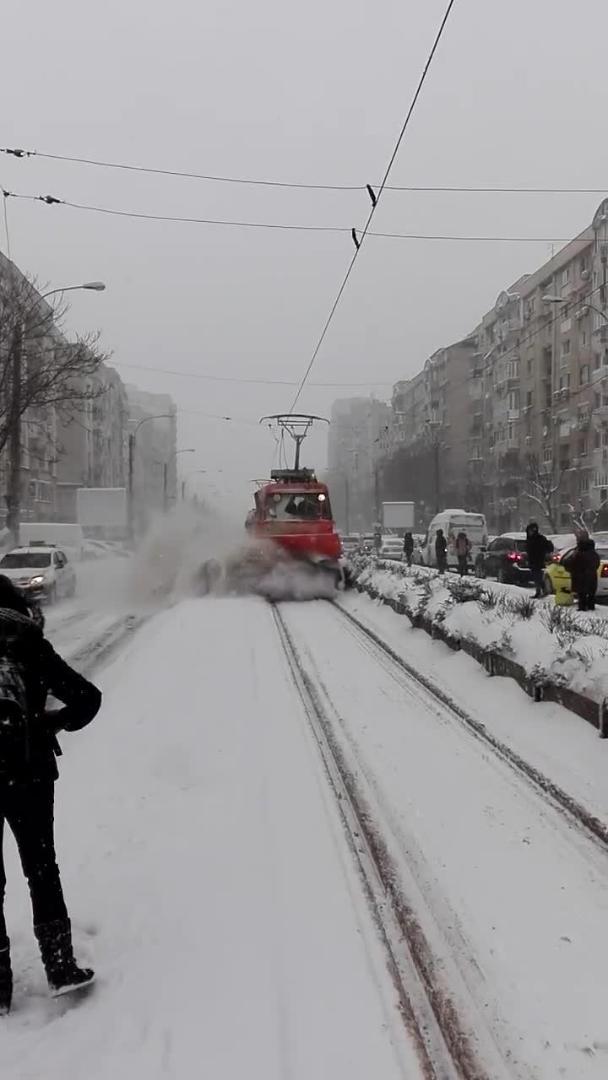 Snow Plow Covers Bystanders in Snow | Jukin Licensing