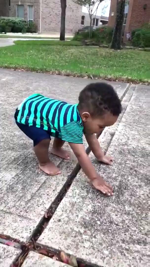 Little Boy Dramatically Crawls Over Crack in Sidewalk | Jukin Licensing