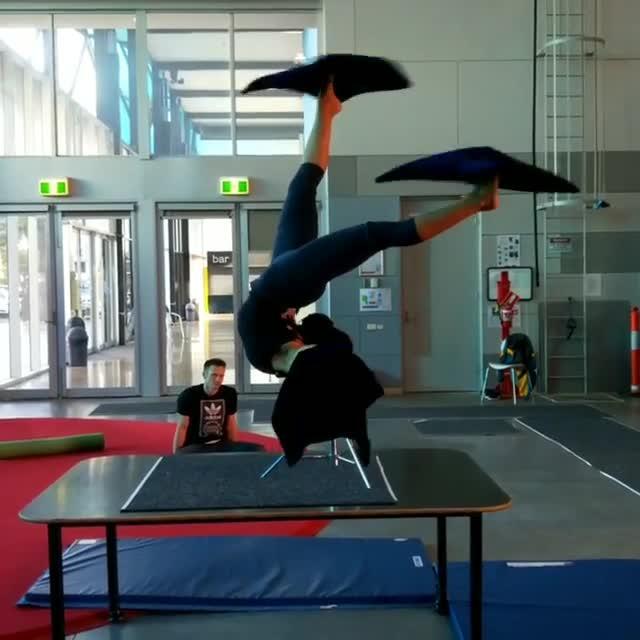 Contortionist Spins Fabric While Balancing on Chin | Jukin Licensing