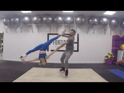 Ice Skating Duo Does Mid Air Upside Down Split While Spinning | Jukin ...