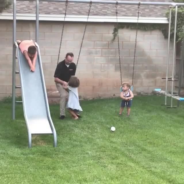 Man Thrown off Swing While Trying to Lift up Kid | Jukin Media Inc