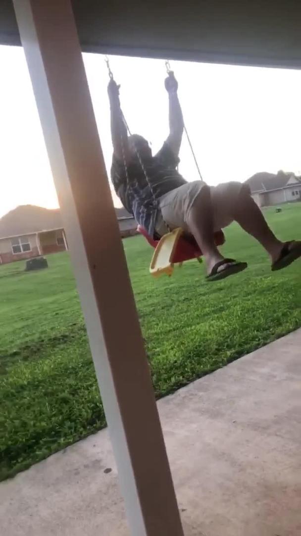 Man Thrown off Swing While Trying to Lift up Kid | Jukin Media Inc