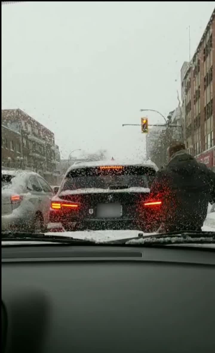 Canadian Guy Shows Road Rage by Wiping Random Guy's Windshield | Jukin ...