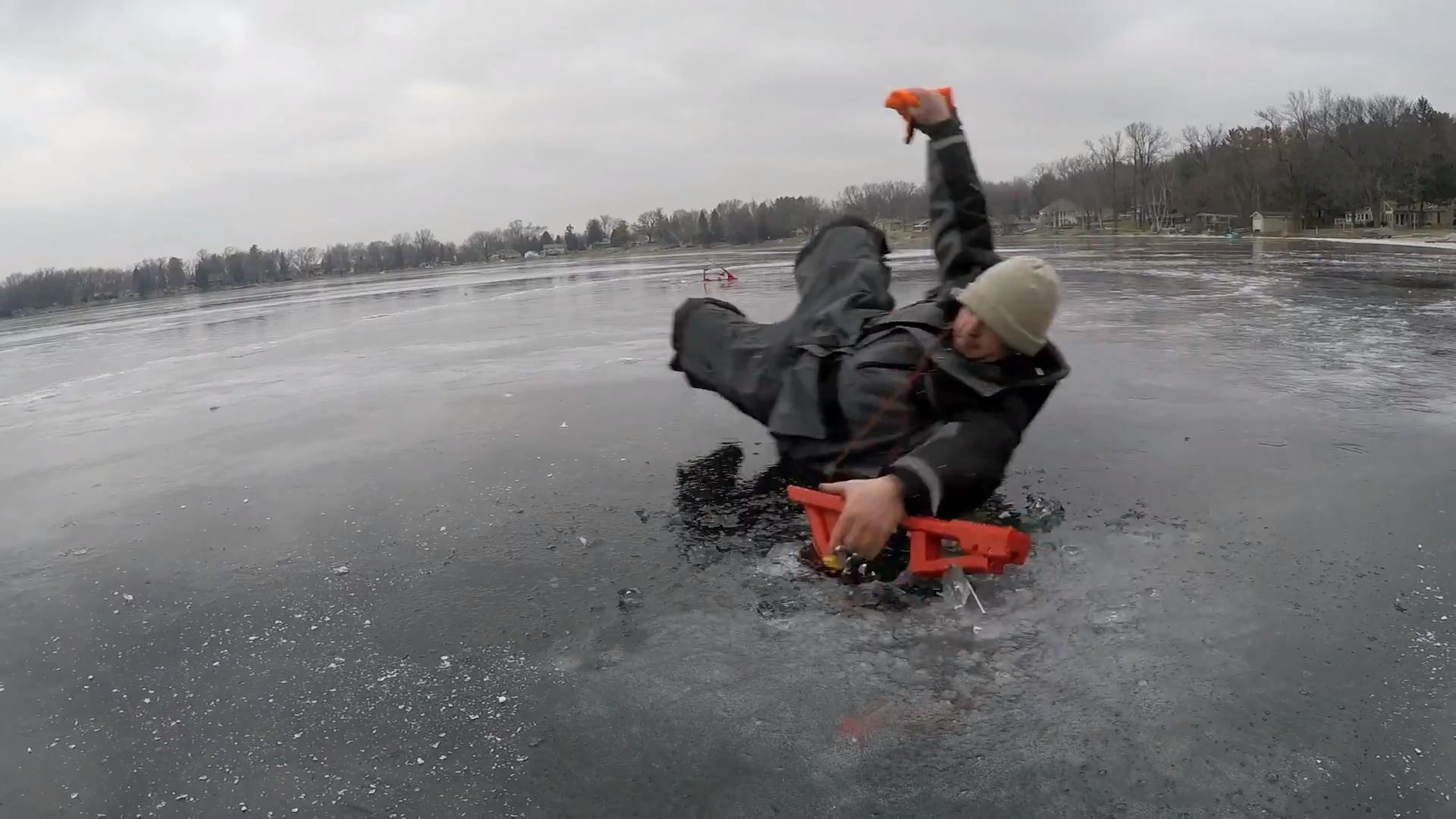 Man Falls Into Lake After Casting Fishing Line | Jukin Media Inc