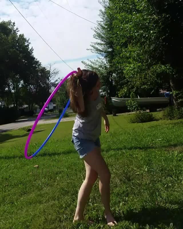 Girl Falls on Butt While Hula Hooping | Jukin Media Inc