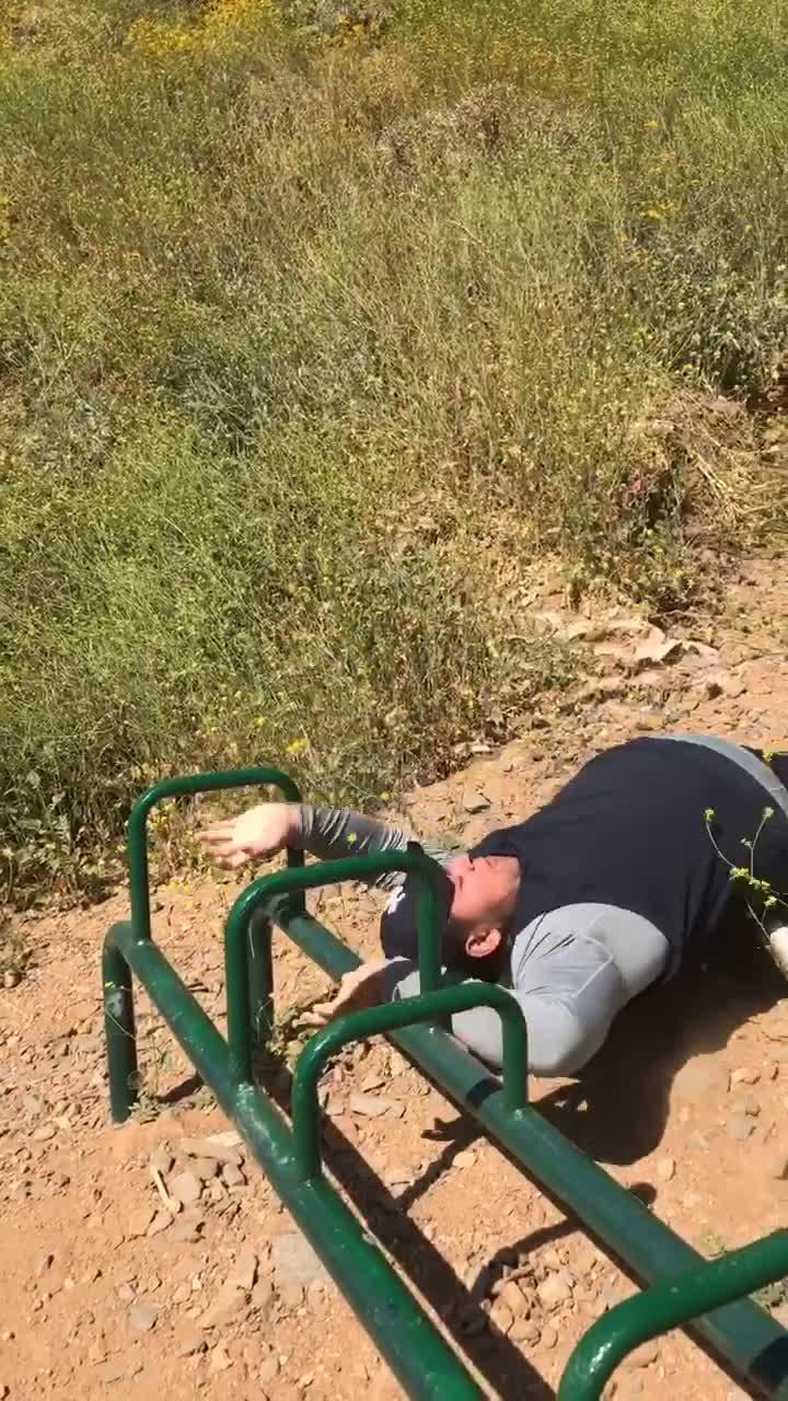 Guy Falls on Back Attempting Handstand Push Up on Bench | Jukin Licensing