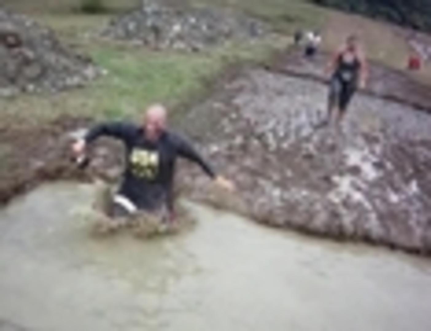 Guy Unwittingly Walks into Deep Mud Puddle | Jukin Media Inc