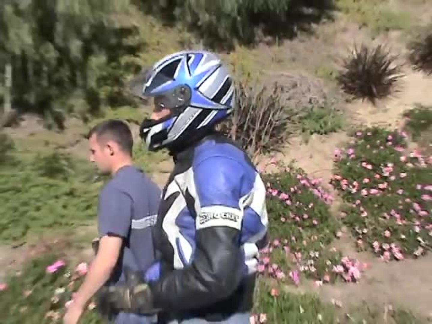 Fallen Biker is Helped Up and Has Bike Inspected | Jukin Licensing