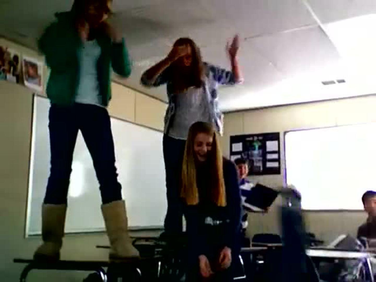 Dancing Girl Falls off Desk | Jukin Licensing