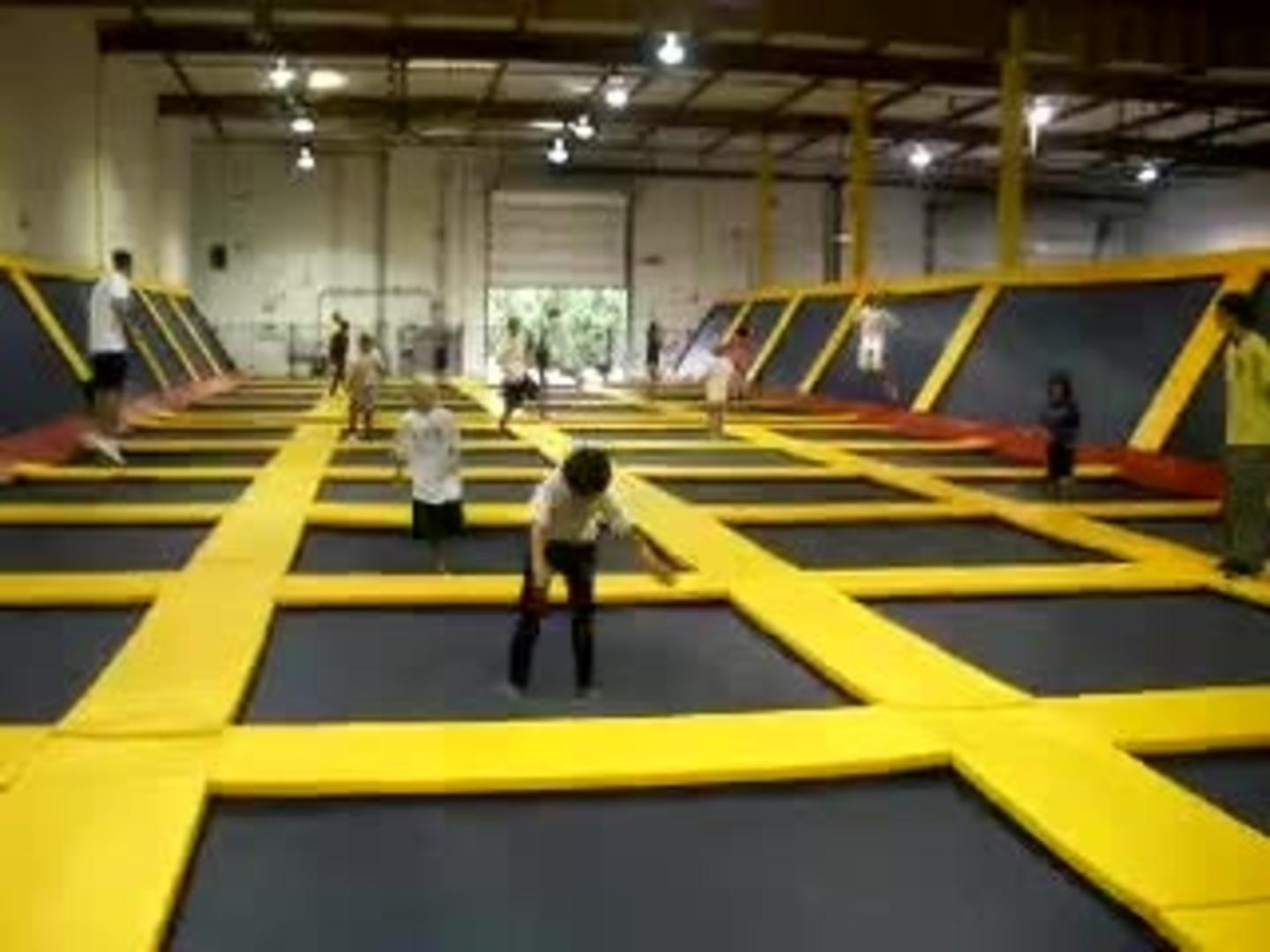 Guy Falls Halfway Off Trampoline | Jukin Media Inc