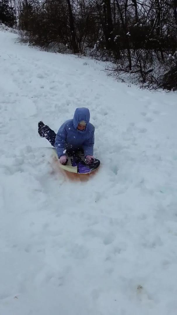 Sledding Girl Has Major Faceplant Fail | Jukin Licensing