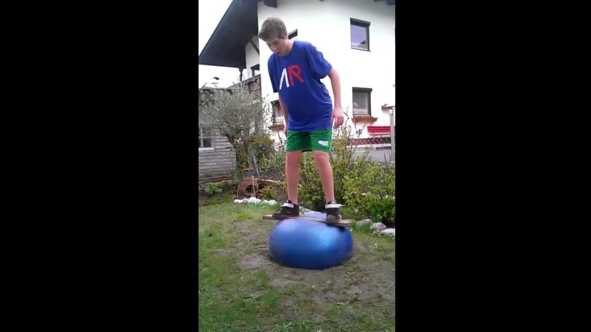 Guy Tries to Balance on Red Yoga Ball | Jukin Media Inc