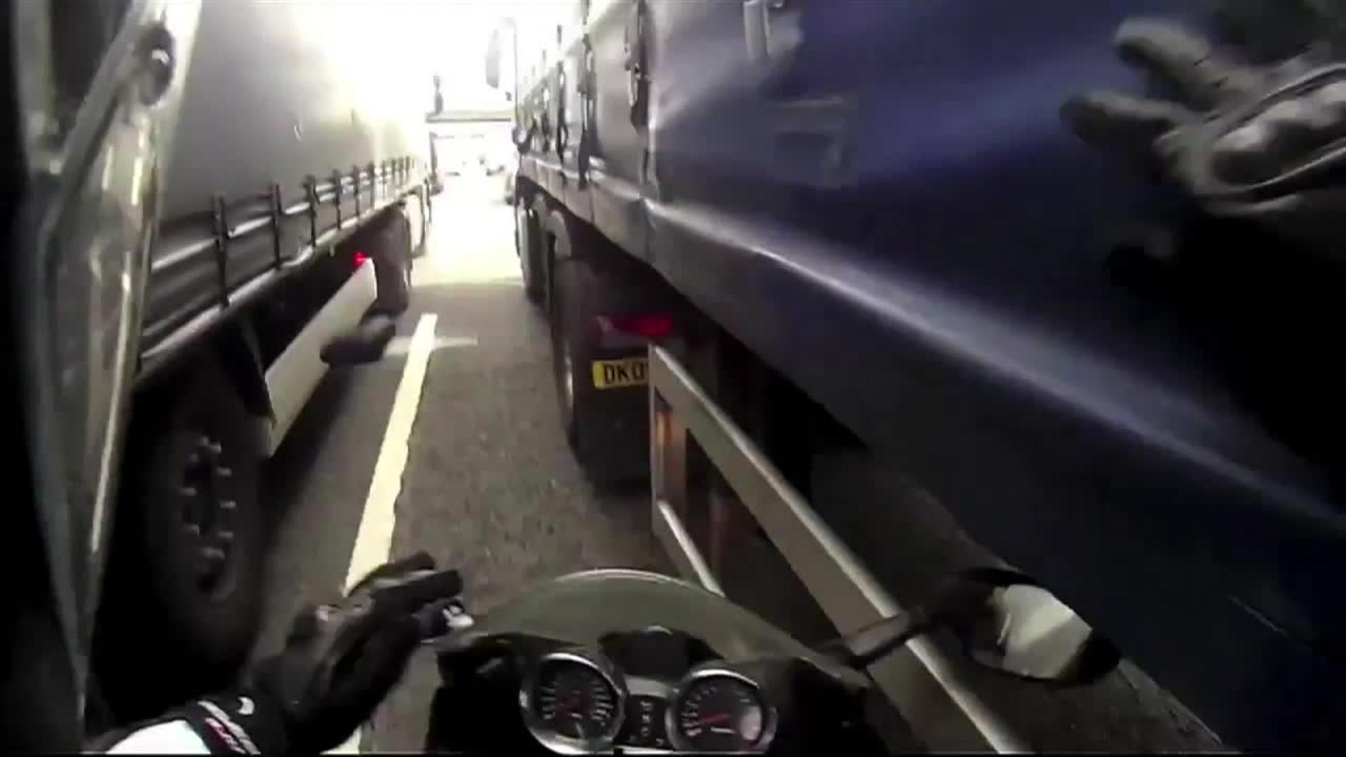 Motorcycle Crashes into Back of Car | Jukin Media Inc