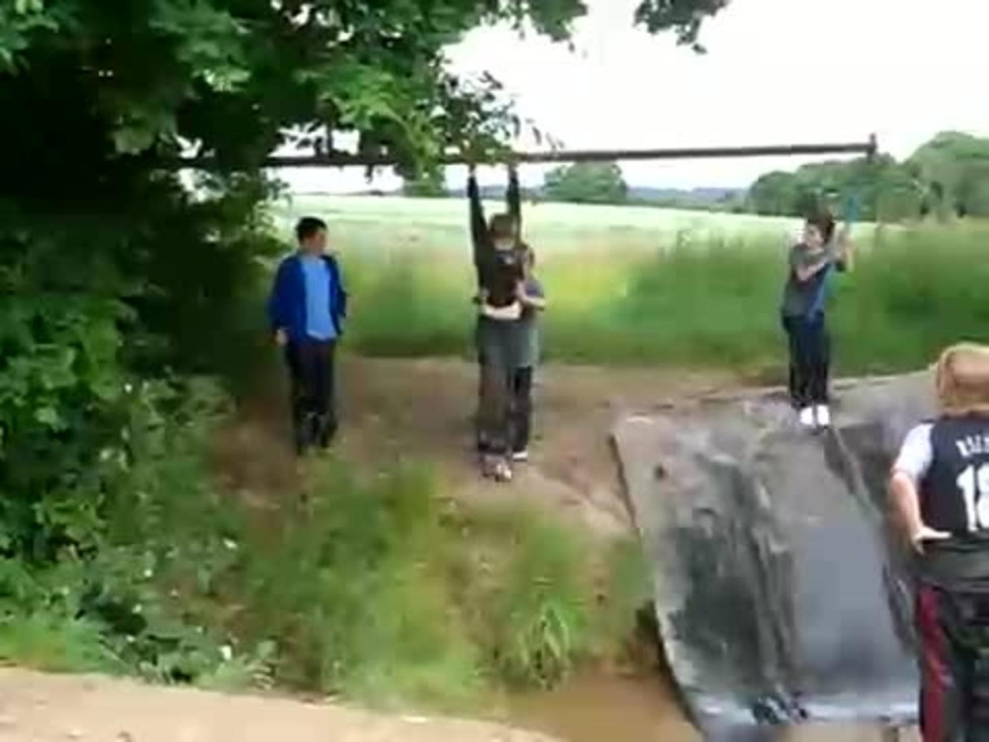 Boy Slips off Swinging Pole into Water | Jukin Licensing