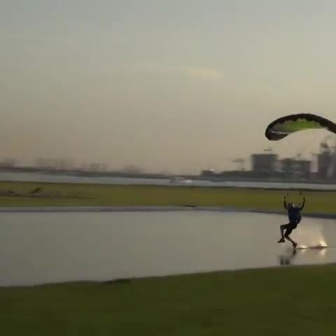 Skydiving Guy Lands Expertly Swooping Over Water | Jukin Licensing