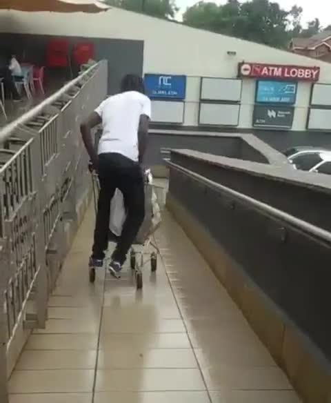 Man Falls Trying to Ride Shopping Cart Down a Slippery Ramp | Jukin ...
