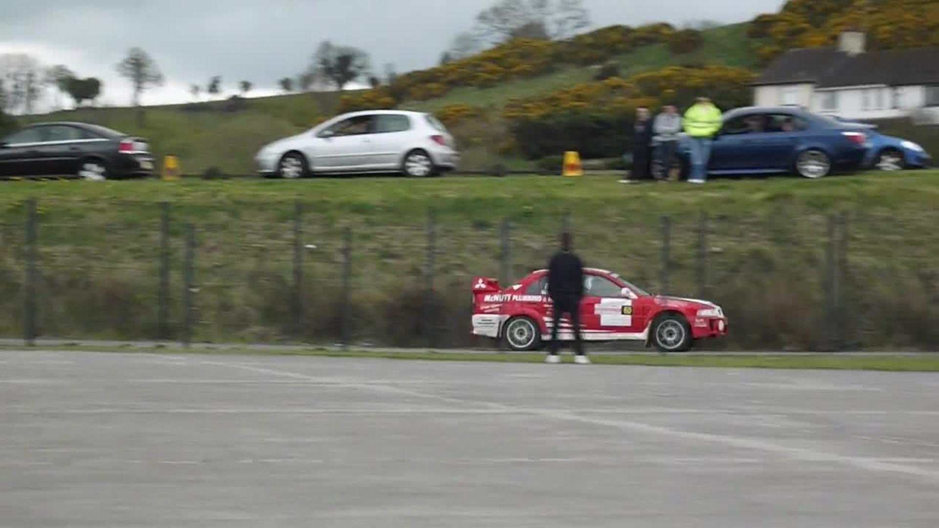 Red Rally Car Flips on Track | Jukin Licensing