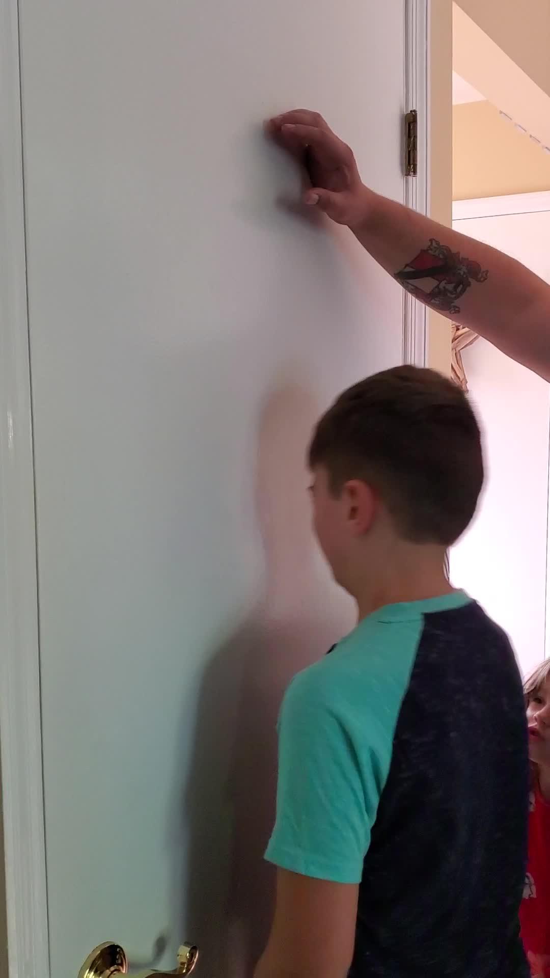 Kid Slams Head on Wall While Playing Card Catching Game | Jukin Licensing