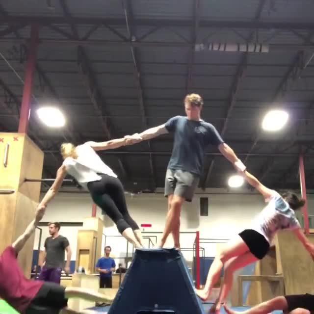 Trio Does Amazing Acrobatic Stunt in Park By Climbing on Each Other ...