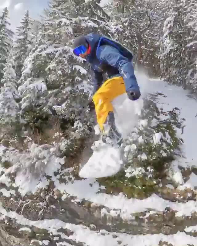 Guy Snowboarding in Mountains Jumps off Cliff and Deploys Parachute ...