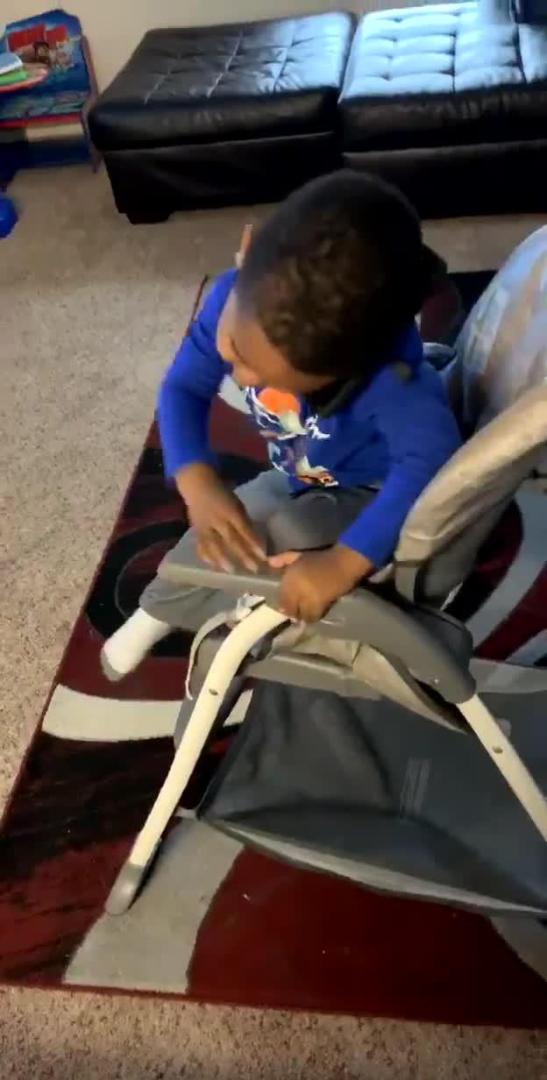 Toddler Falls Off Chair While On Phone | Jukin Licensing