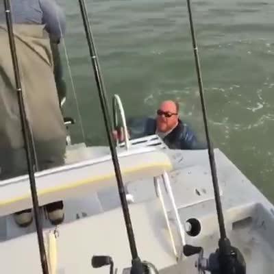 Fisherman Slips off Boat | Jukin Media Inc