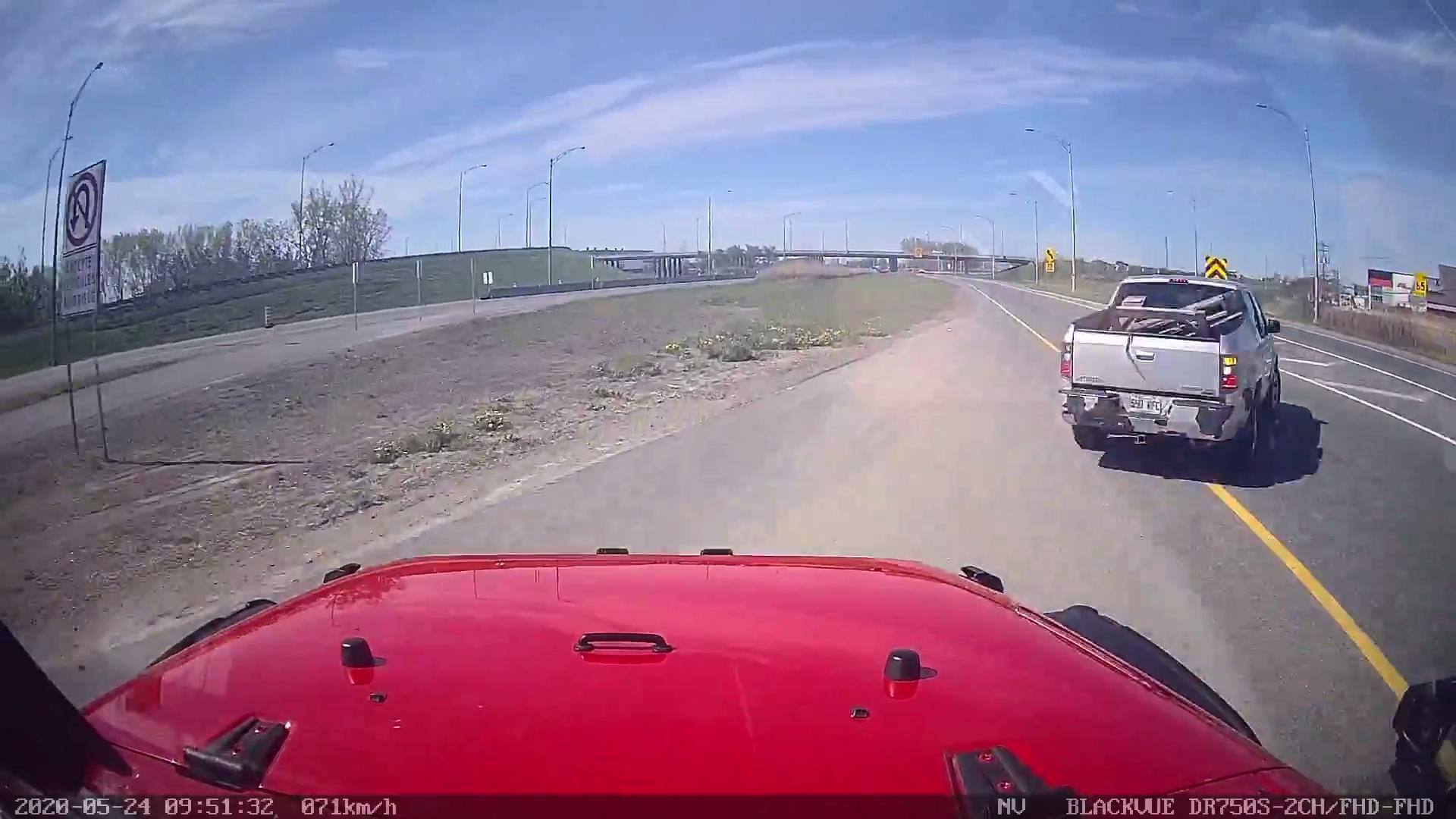Car Swerves Left to Avoid Crashing into Truck Backing Up in the Wrong ...