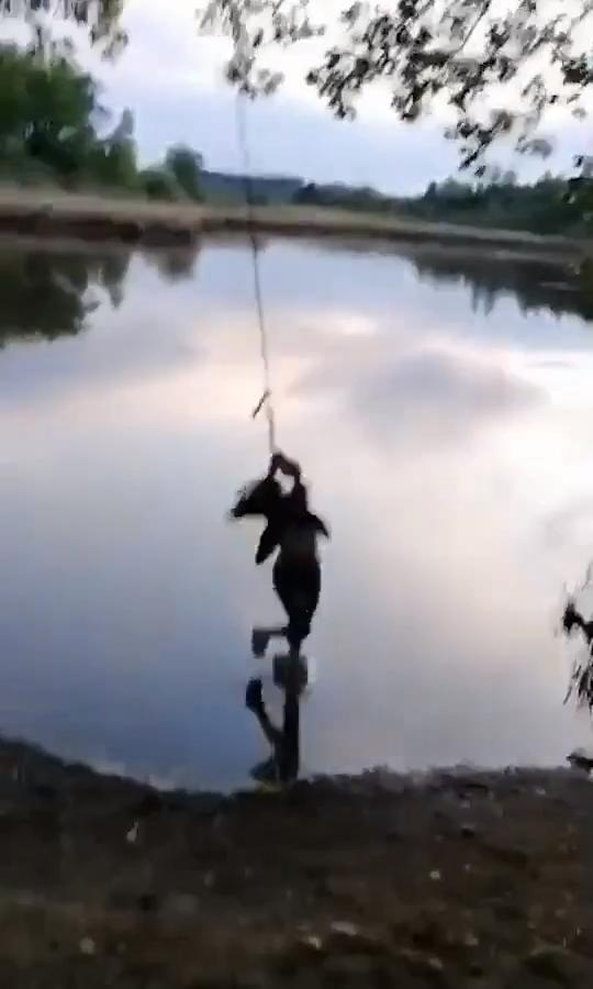 Girl in Bikini Belly Flops off Rope Swing | Jukin Media Inc
