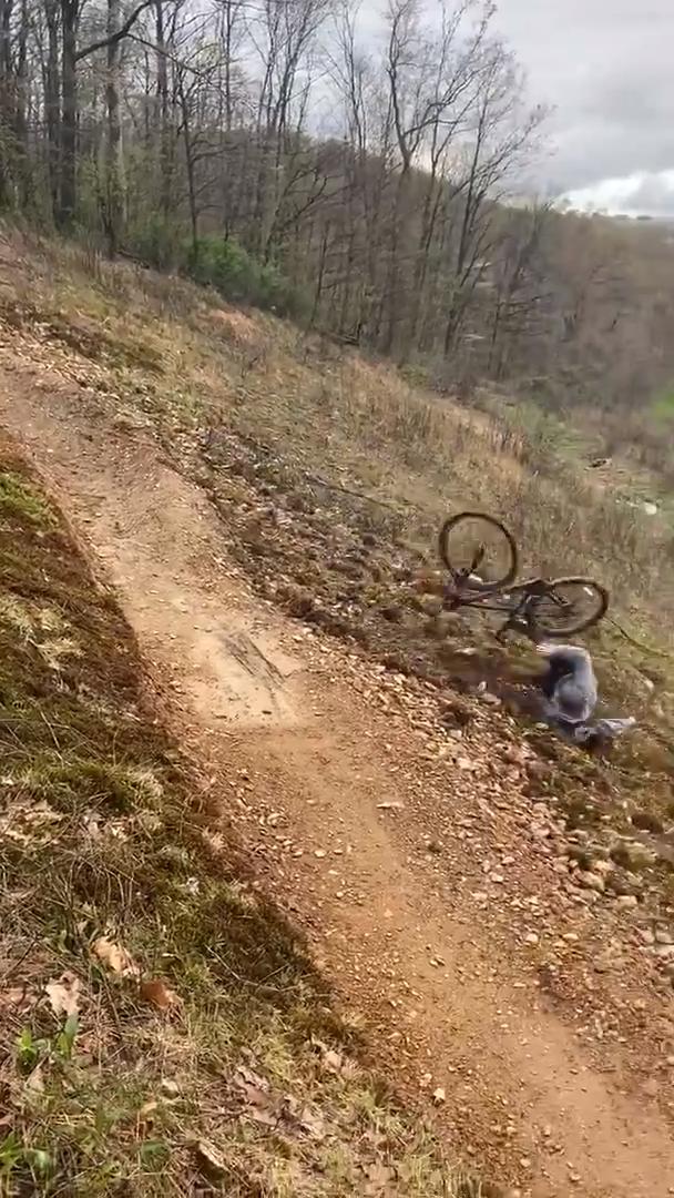 Guy Falls off Mountain Bike and Slides Under Stage While Riding it on ...
