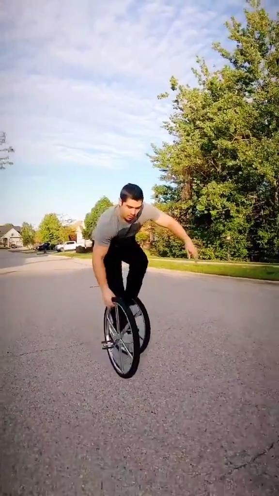 Guy Shows Off Amazing Trick With Two Unicycles | Jukin Licensing