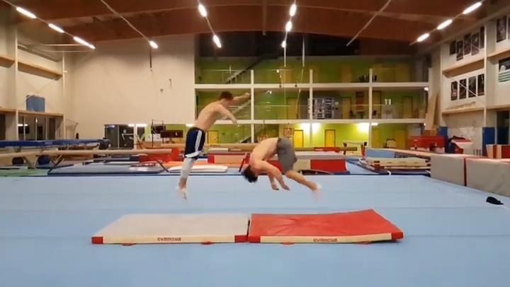 Acrobat Duo Perform Coordinated Flip Over Each Other | Jukin Licensing