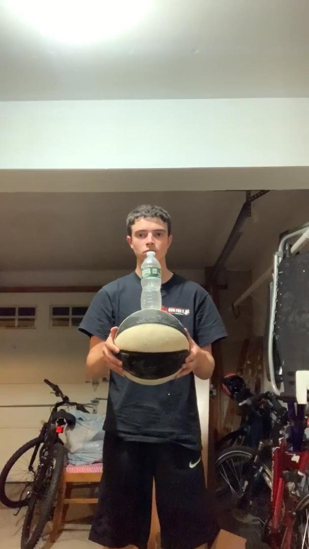 Guy Gets Hit on Groin While Trying to Catch Bottle Placed on Bouncing ...