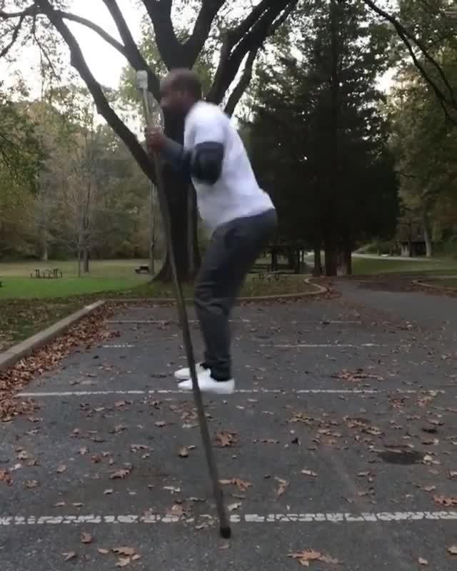 Man Does Spins and Climbs Ladder While Doing Balancing Trick | Jukin ...