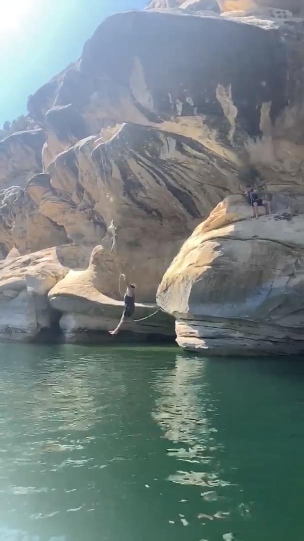 Teenager Trying to Rope Swing Off Cliff Falls When Return Rope Comes In ...