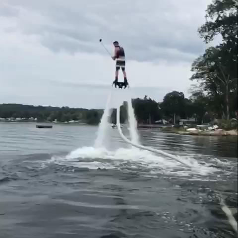 Guy Hits Golf Ball Off Platform in Water While Riding Flyboard | Jukin ...