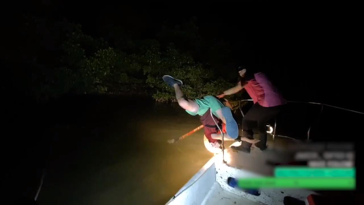 Guy Almost Falls Off Boat Into Water While Spearfishing | Jukin Licensing