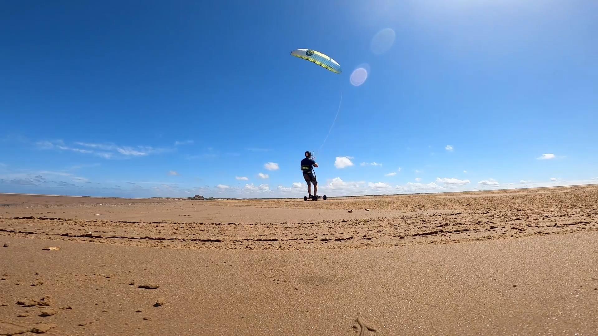 Guy Performs Tricks While Kite Landboarding | Jukin Licensing