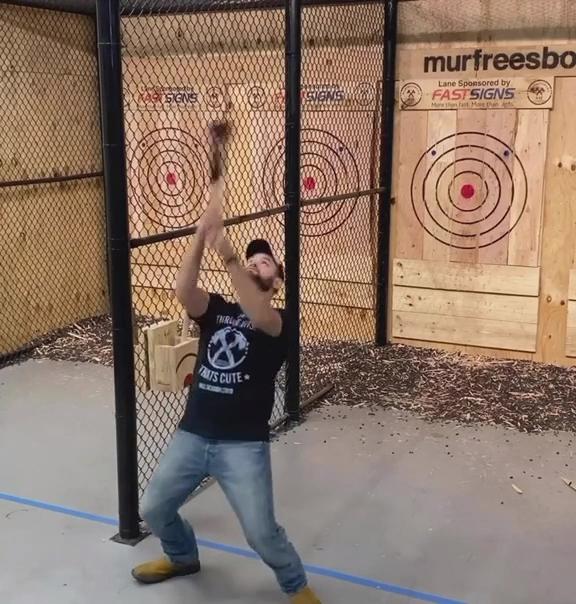 Guy Throws Axe At Target Without Looking at it | Jukin Media Inc