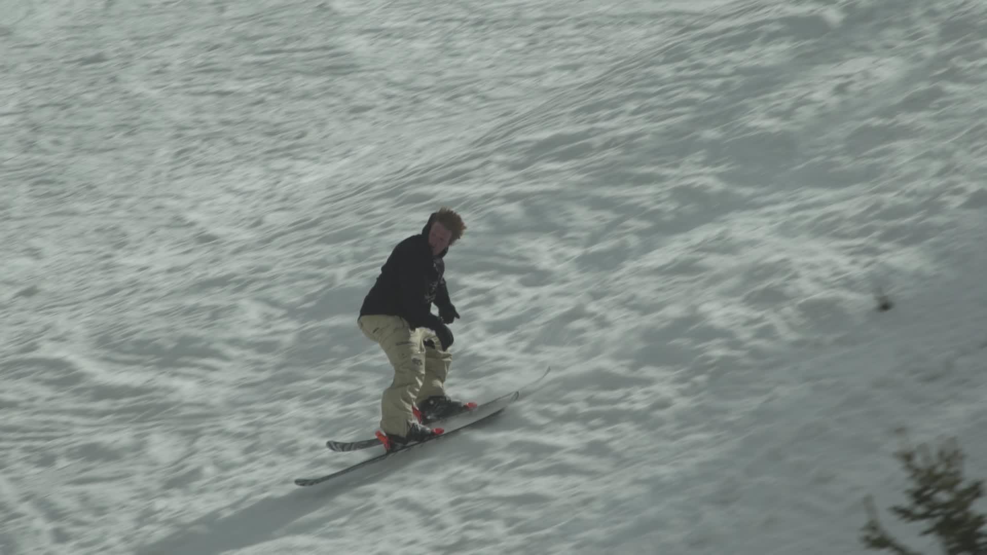 Skier Flips Over Snow Boulder on Snowy Slope | Jukin Licensing