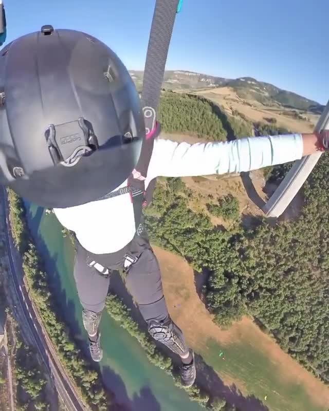 Two People Perform Base Jumping From High Bridge | Jukin Licensing
