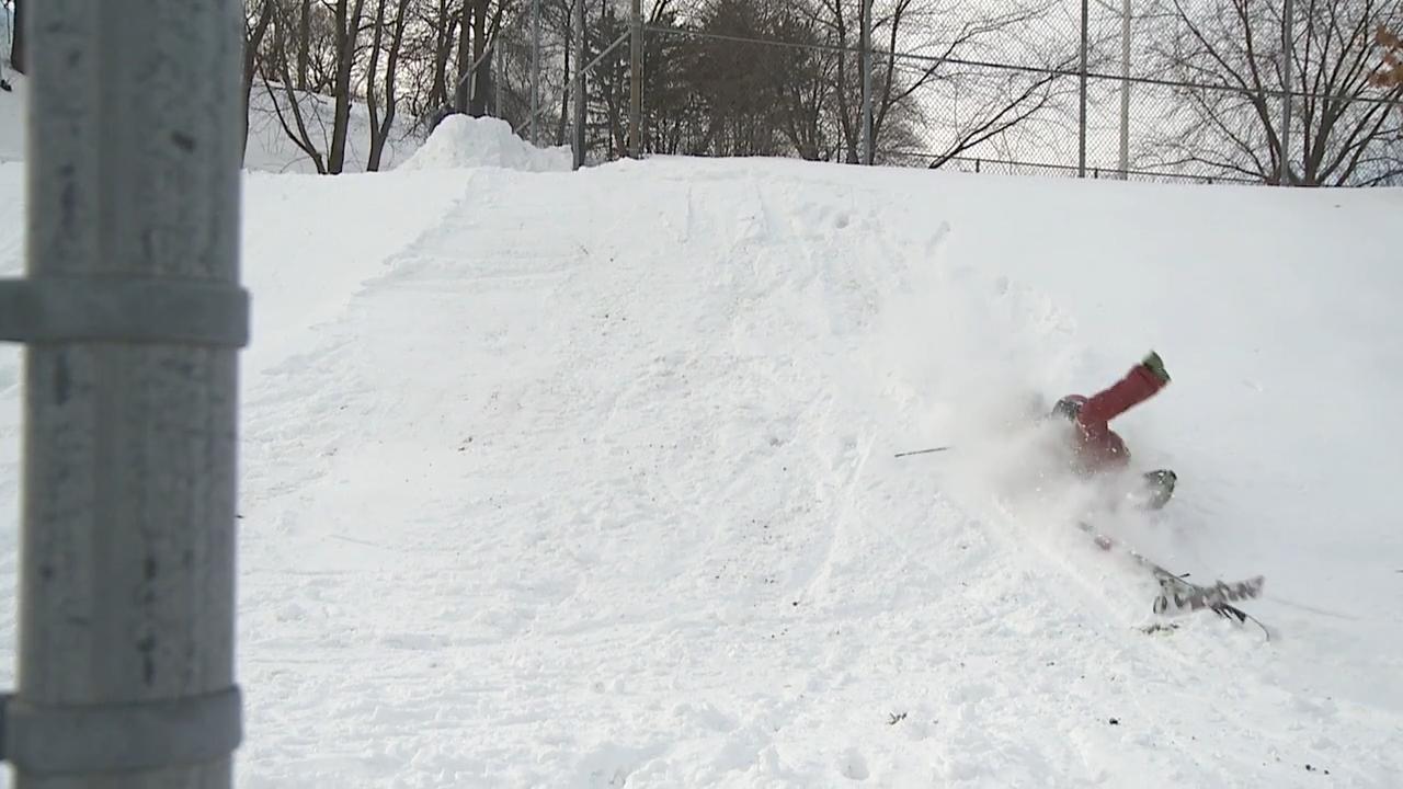 Guy Crashes Hard While Jumping Over Snow Covered Tree | Jukin Media Inc