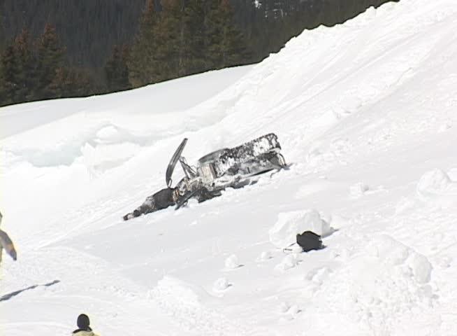 Guy Gets Stuck Under Snowmobile | Jukin Media Inc