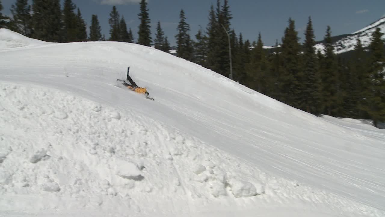 Guy Doing Ski Jump from Steep Slope Falls on Landing and Rolls ...