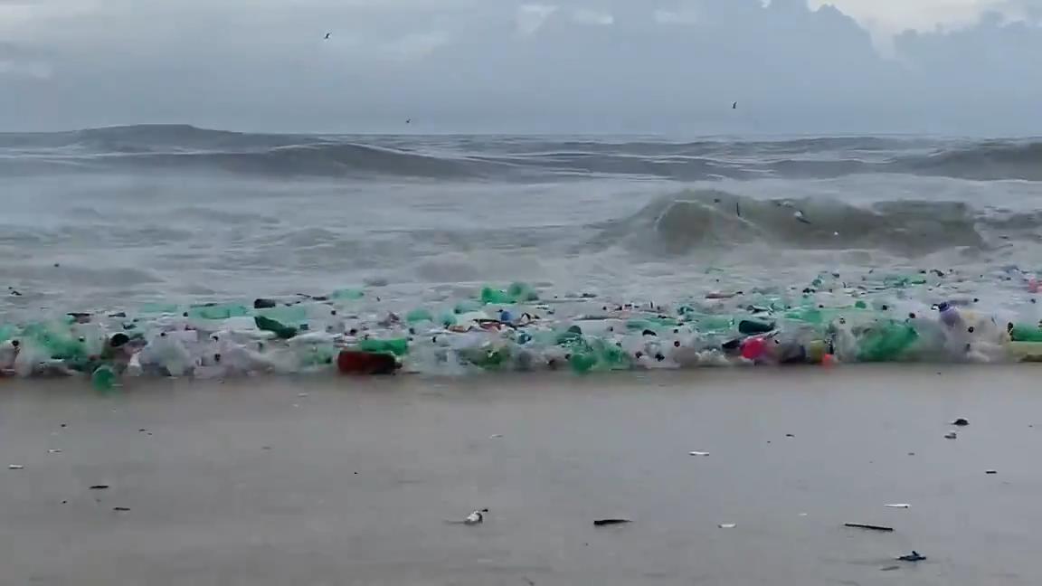 Sea Waves Bring Plastic Waste Materials Into Shore | Jukin Licensing