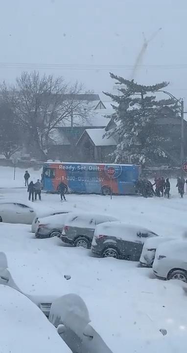 Bus Stuck In Snow Rescued By Students By Pushing It | Jukin Licensing