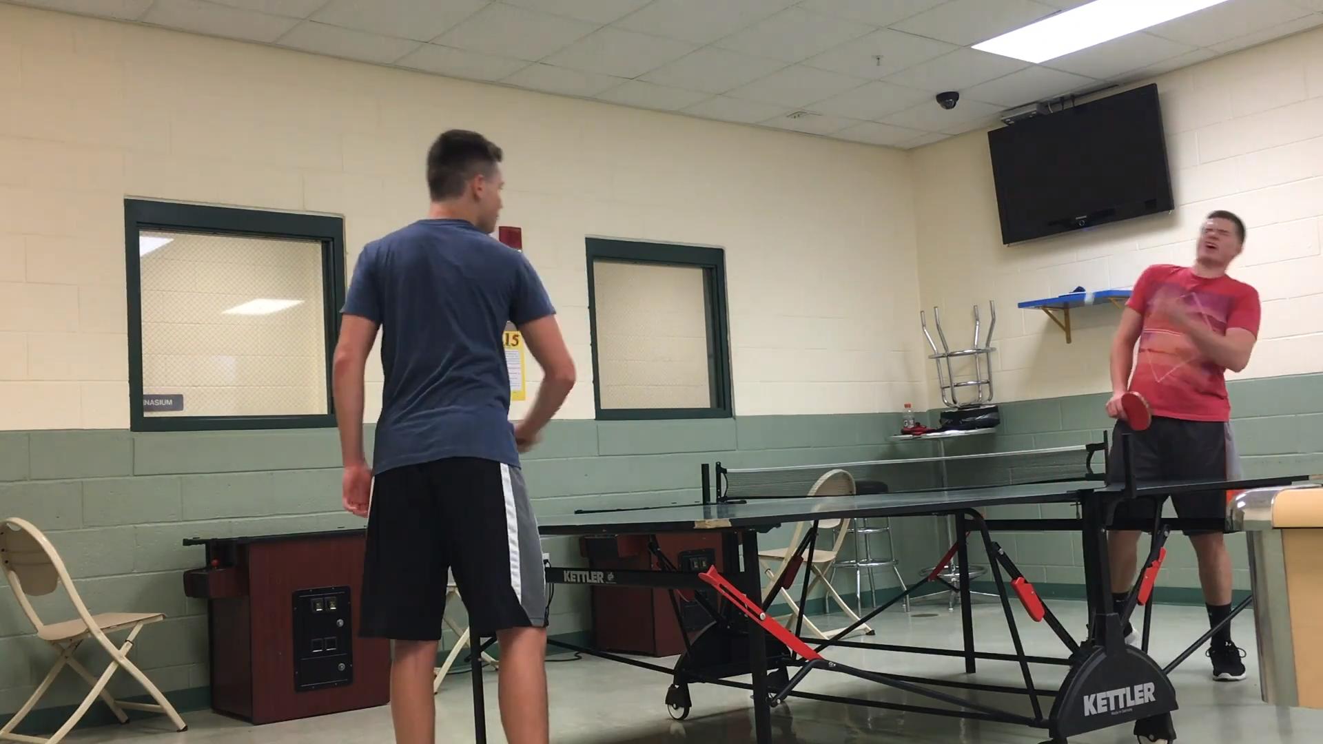 Guy Hits Brother in the Eye With Ping Pong Ball While Playing Table ...