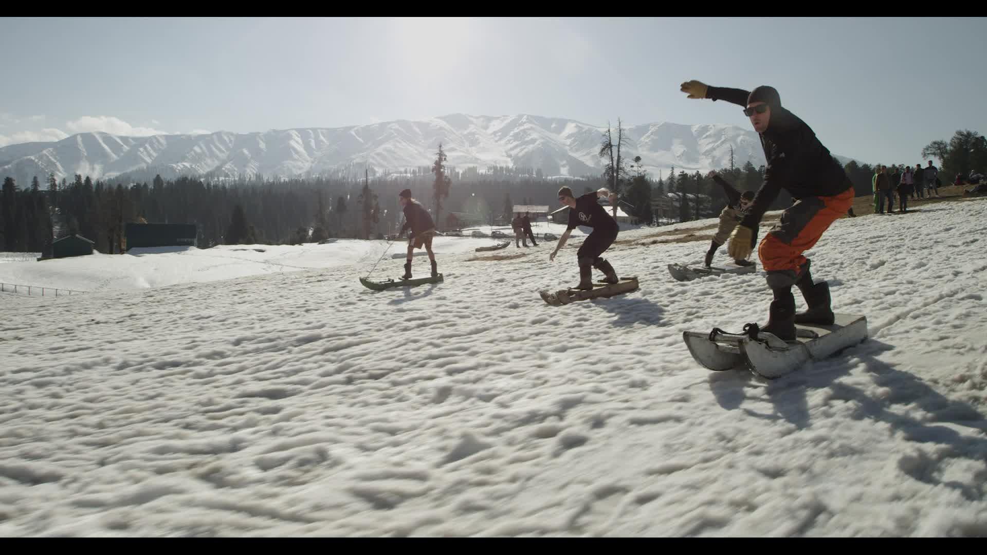 Guys Crash in Snow While Racing Downhill on Sleds | Jukin Media Inc